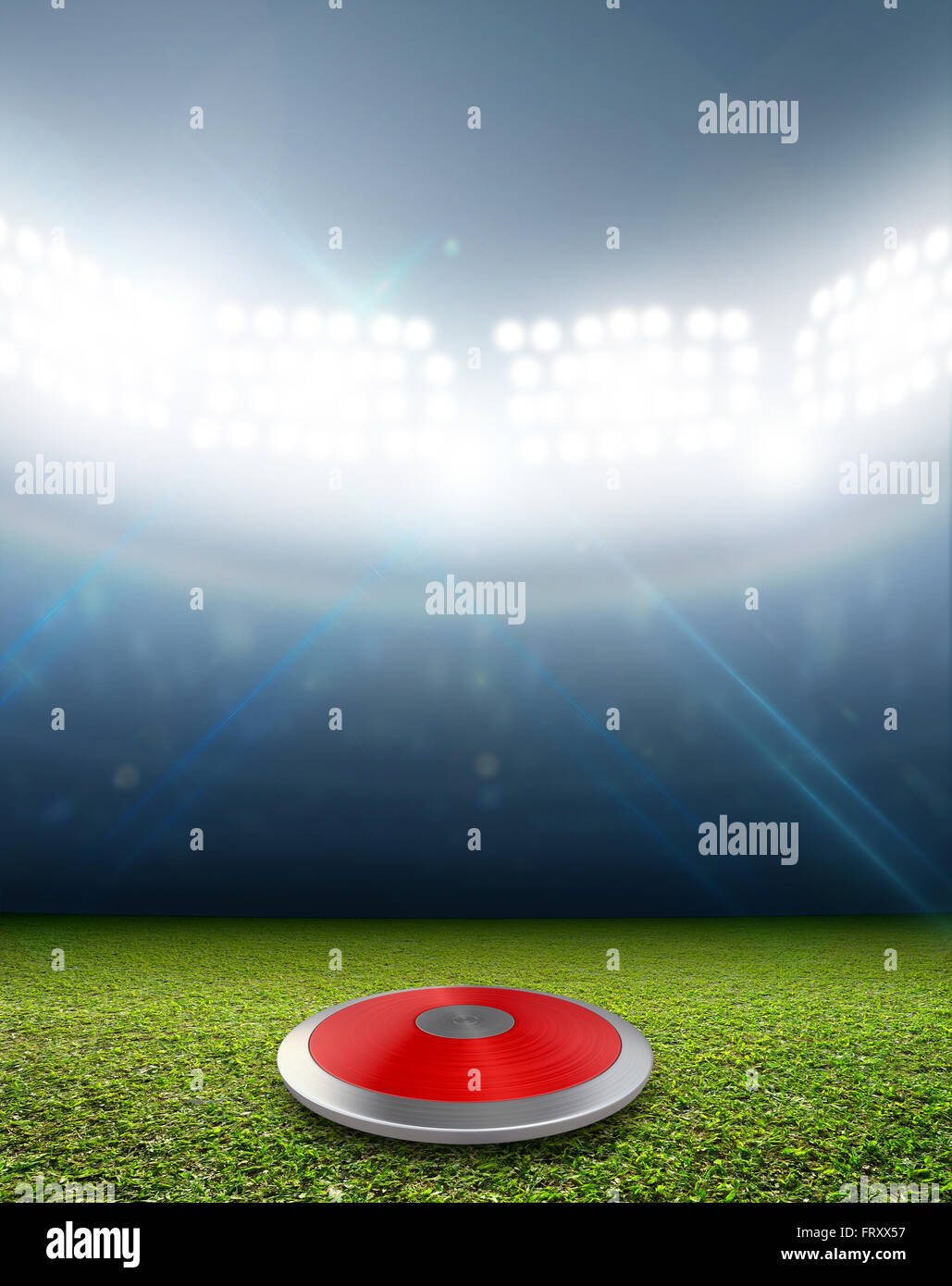 A discus in a generic stadium resting on an unmarked green grass pitch ...