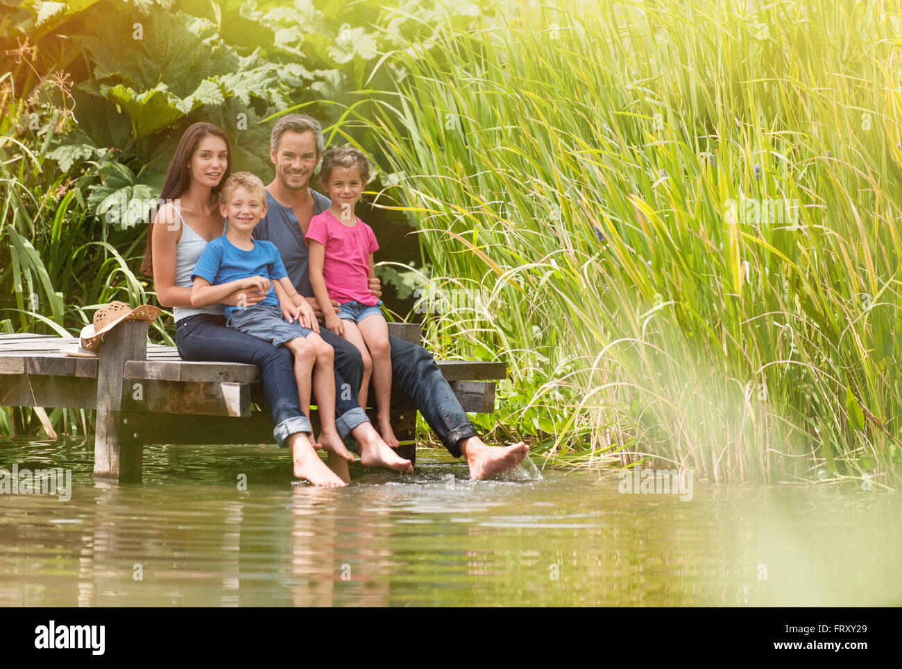 Woman pointing lake man daughter hi-res stock photography and images ...