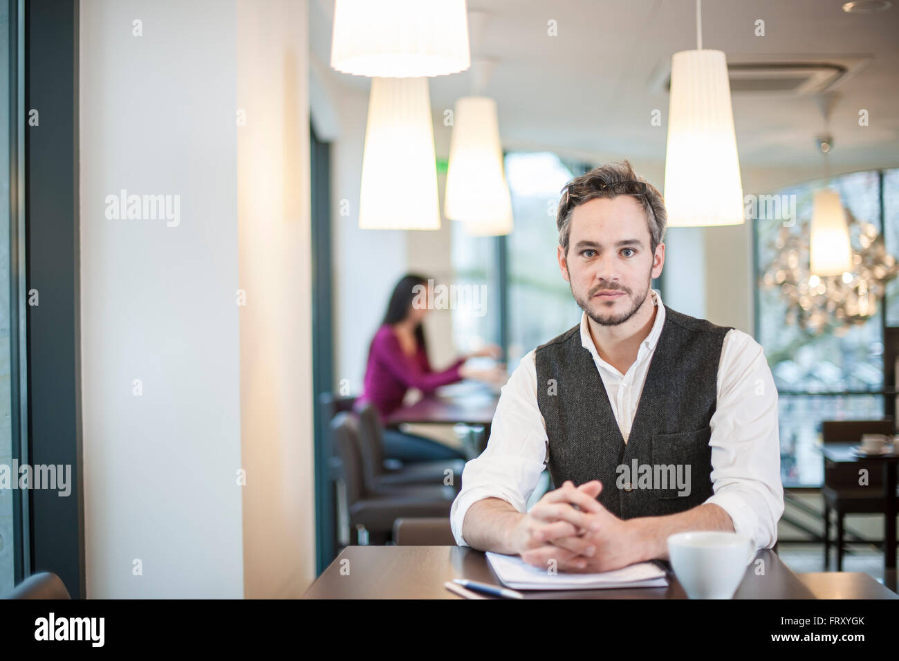 creative man writing in a cafe Stock Photo - Alamy