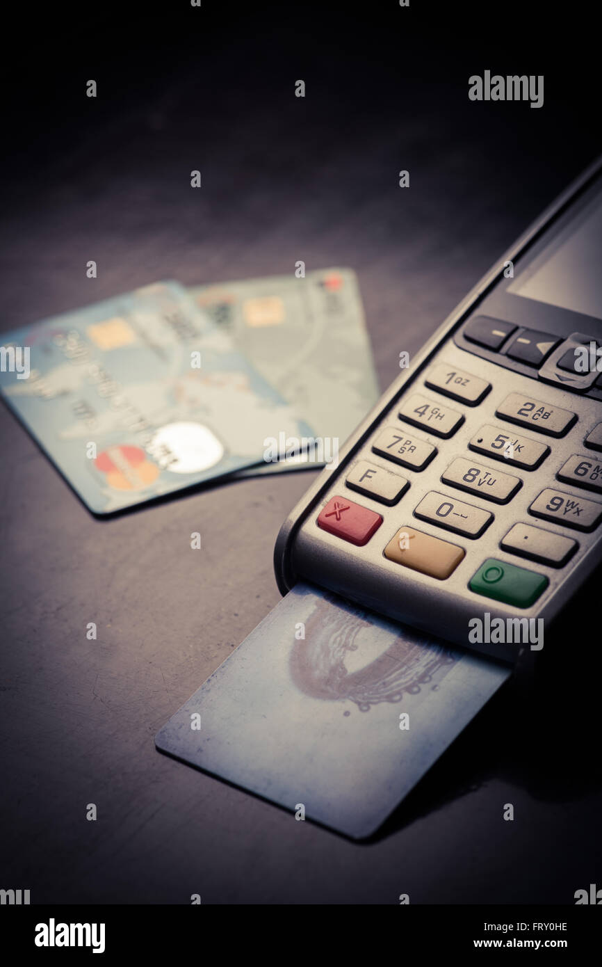 Color image of a POS and credit cards Stock Photo - Alamy