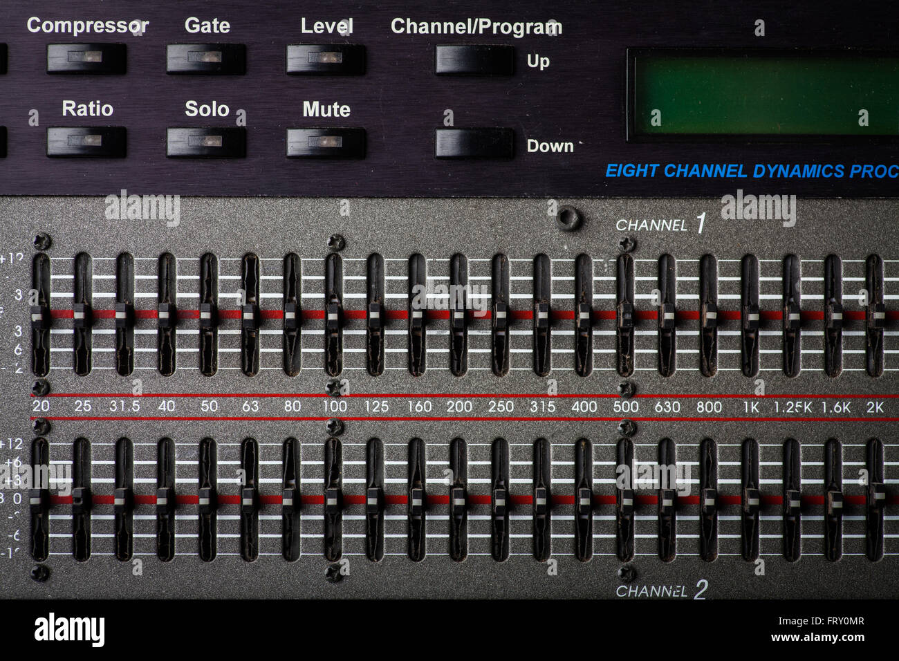 Color image of many buttons on a sound mixer in a recording studio ...