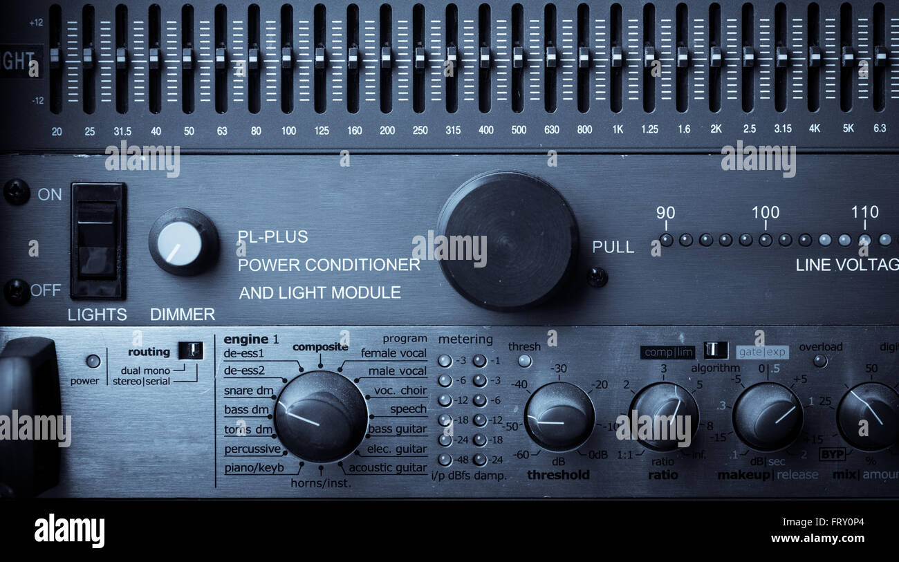 Color image of many buttons on a sound mixer in a recording studio ...