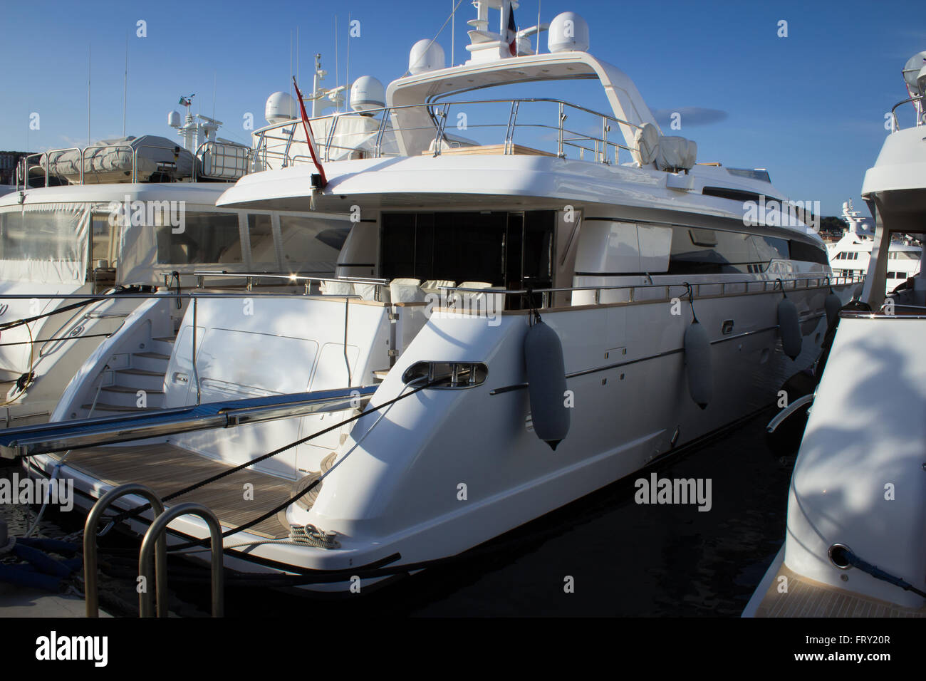 Profile of luxury yacht in the bay, in a sunny day with blue sky Stock ...