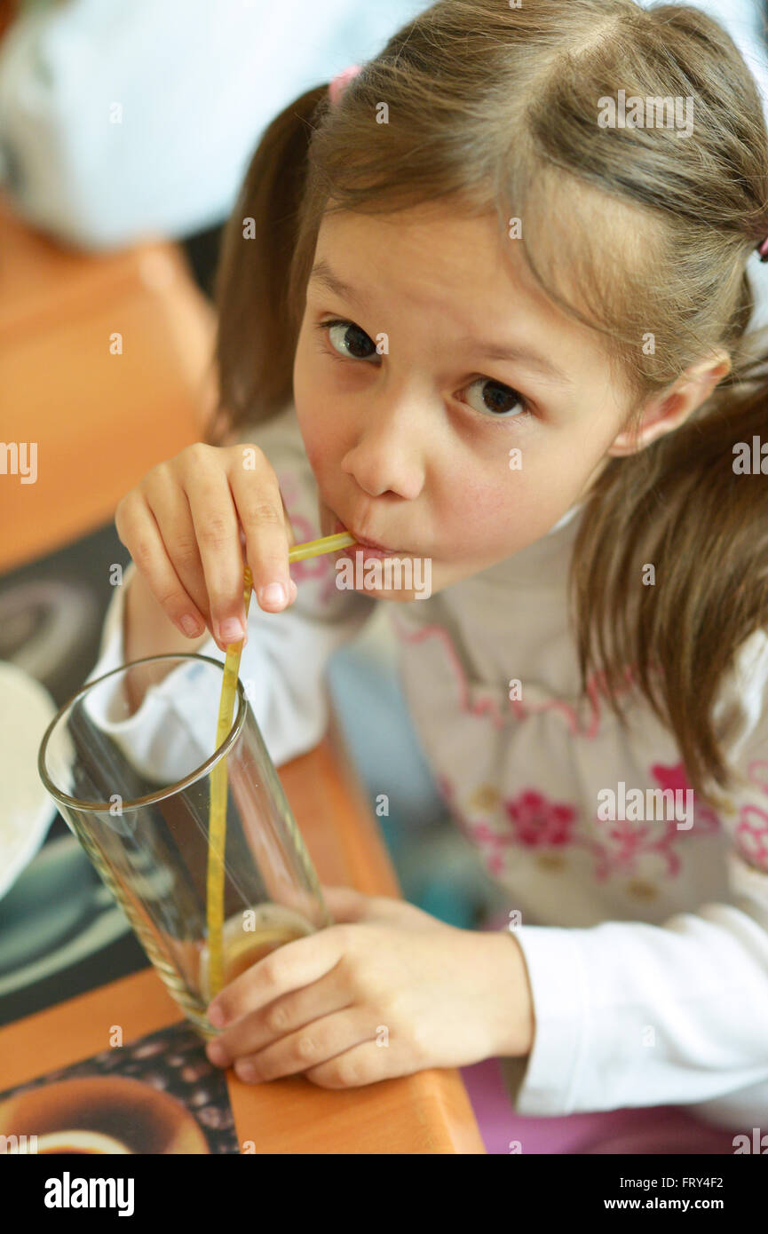 girl drinking juice Stock Photo - Alamy