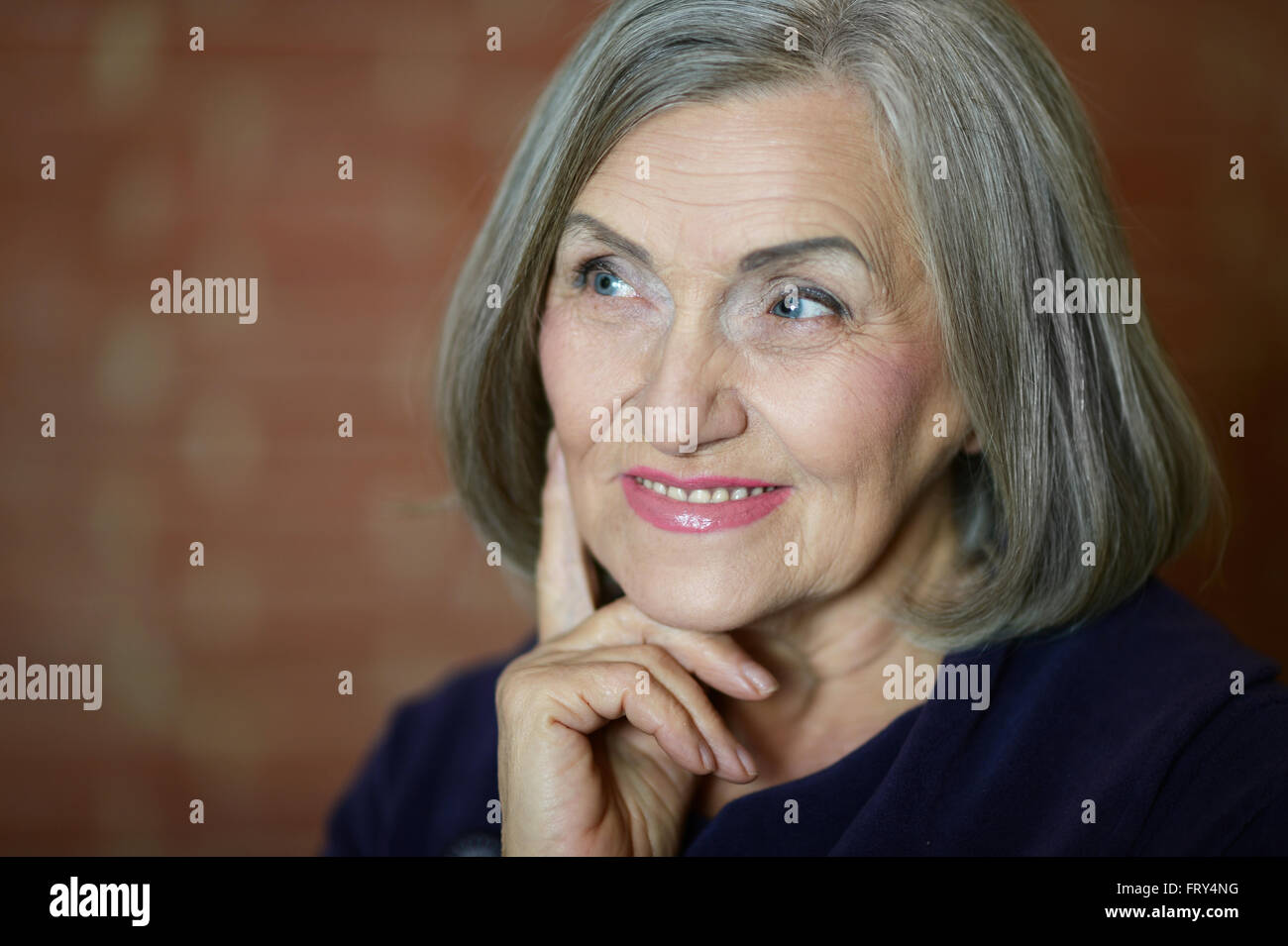 Older woman pointing Stock Photo - Alamy