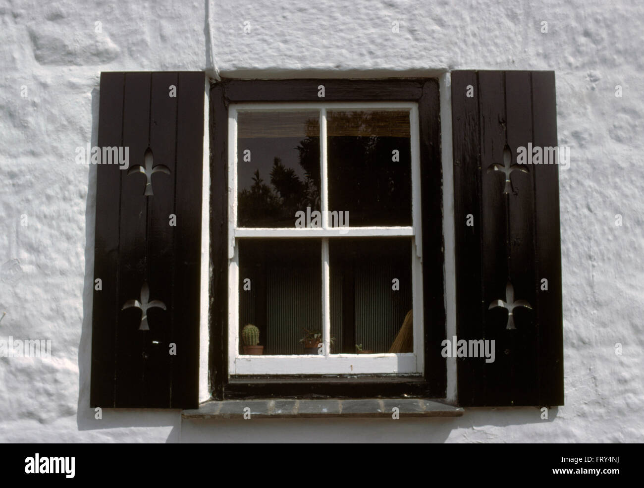 White windows black shutters hi-res stock photography and images - Alamy