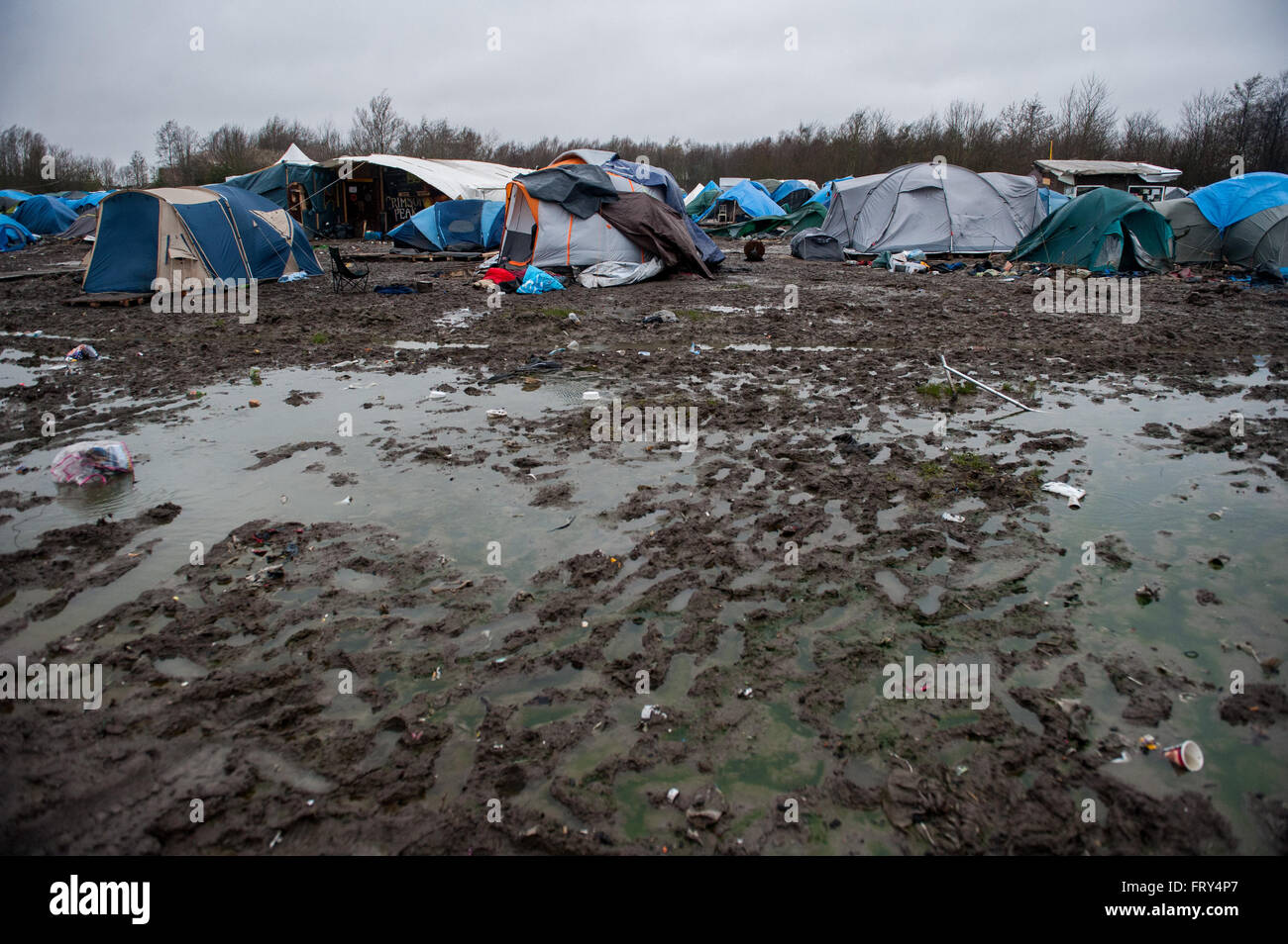 A sense of eeriness prevails as rain and wind force refugees to stay in ...