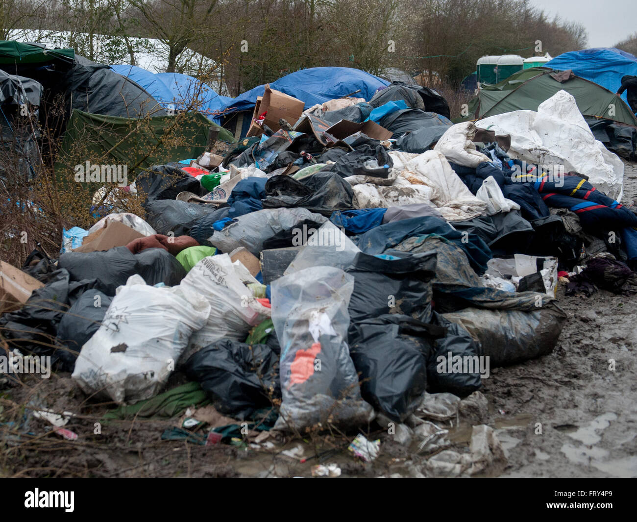A sense of eeriness prevails as rain and wind force refugees to stay in ...