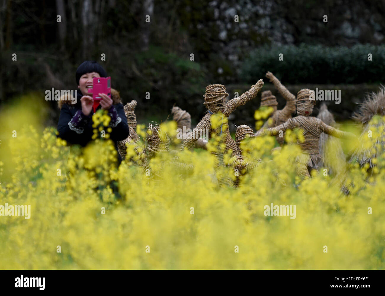 Ninghai, China's Zhejiang Province. 24th Mar, 2016. A tourist takes ...