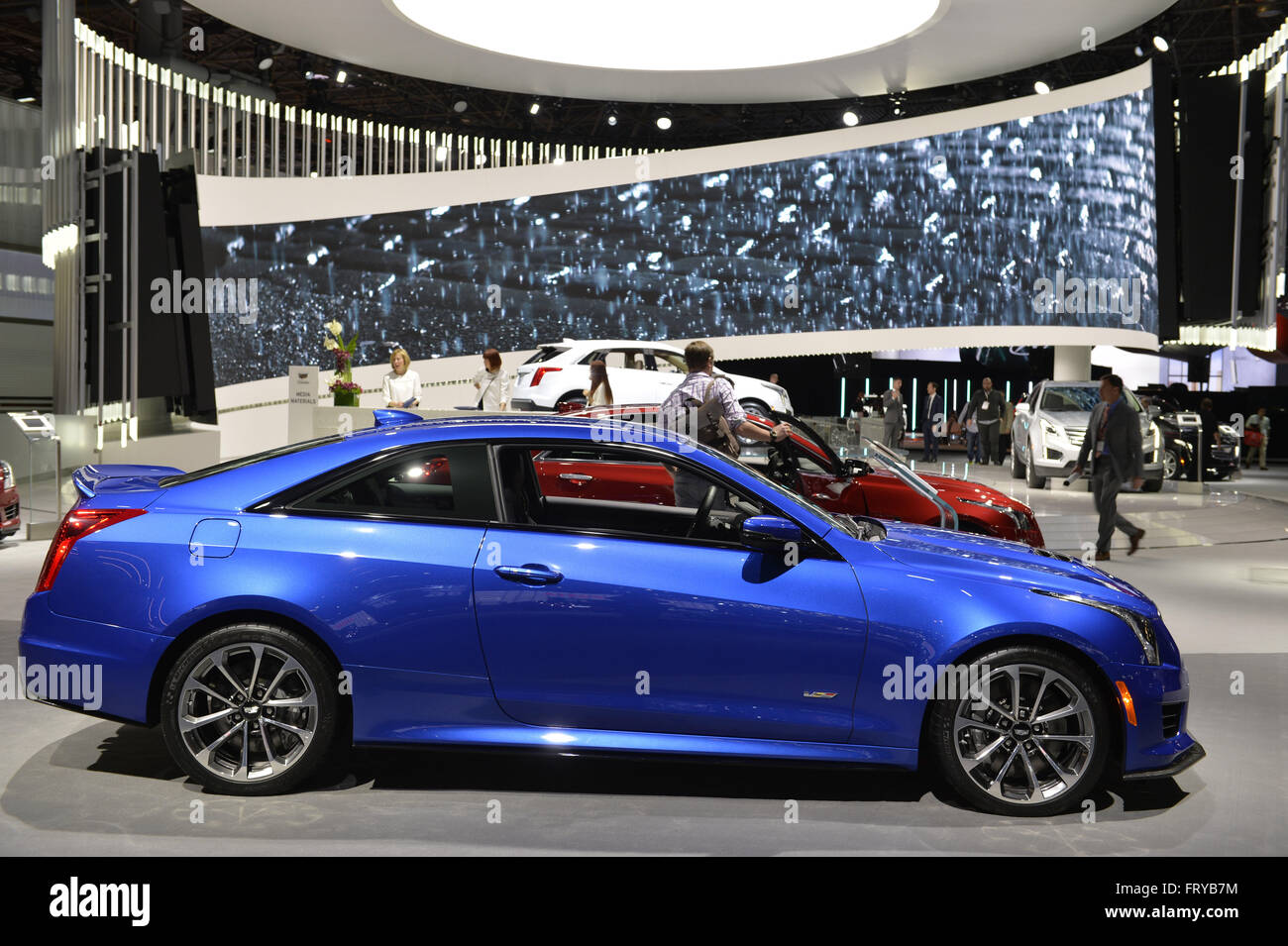 Manhattan, New York, USA. 23rd Mar, 2016. Blue Cadillac ATS-V coupe is ...