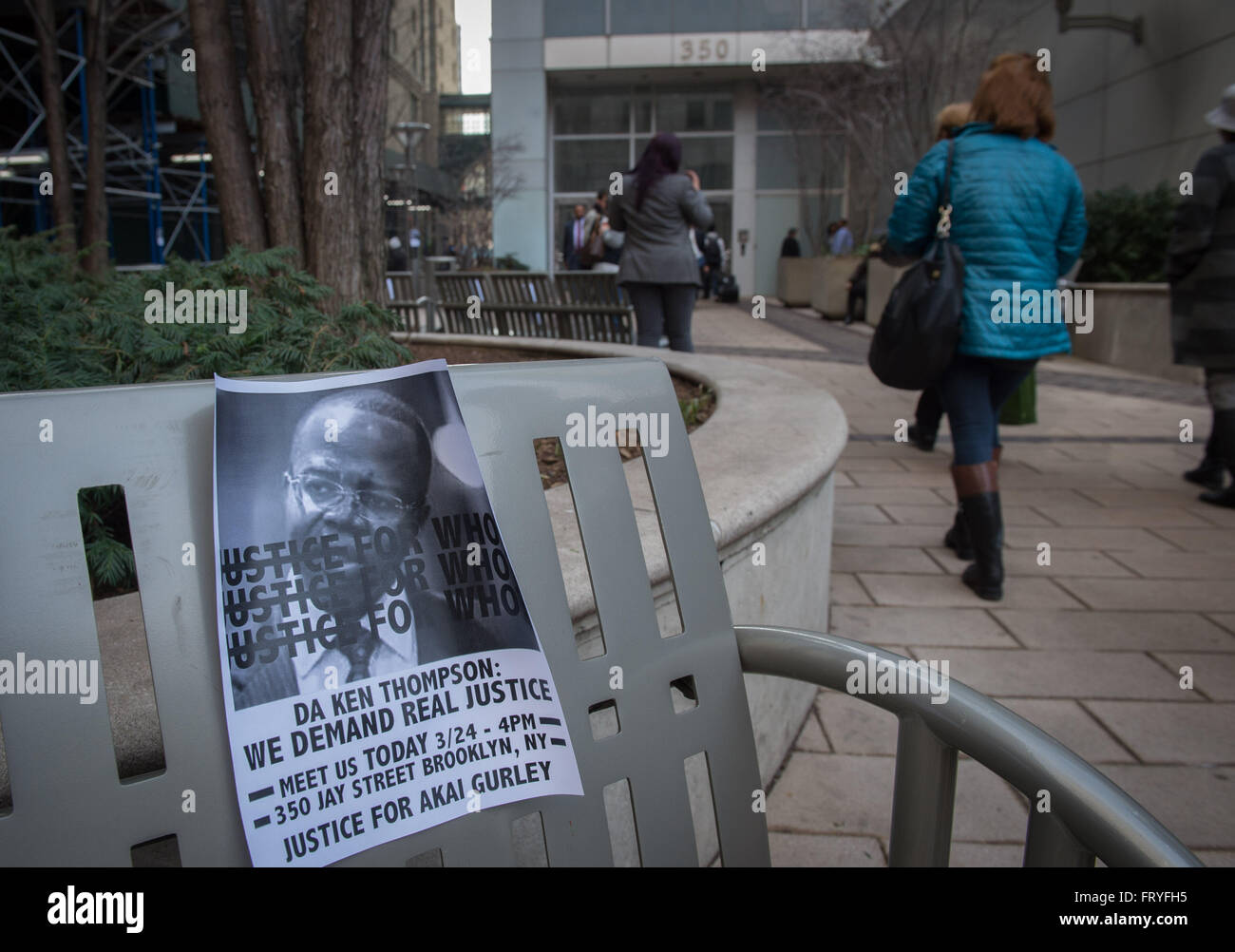 New York, NY, USA. 24th Mar, 2016. A protest sign is taped to a bench ...
