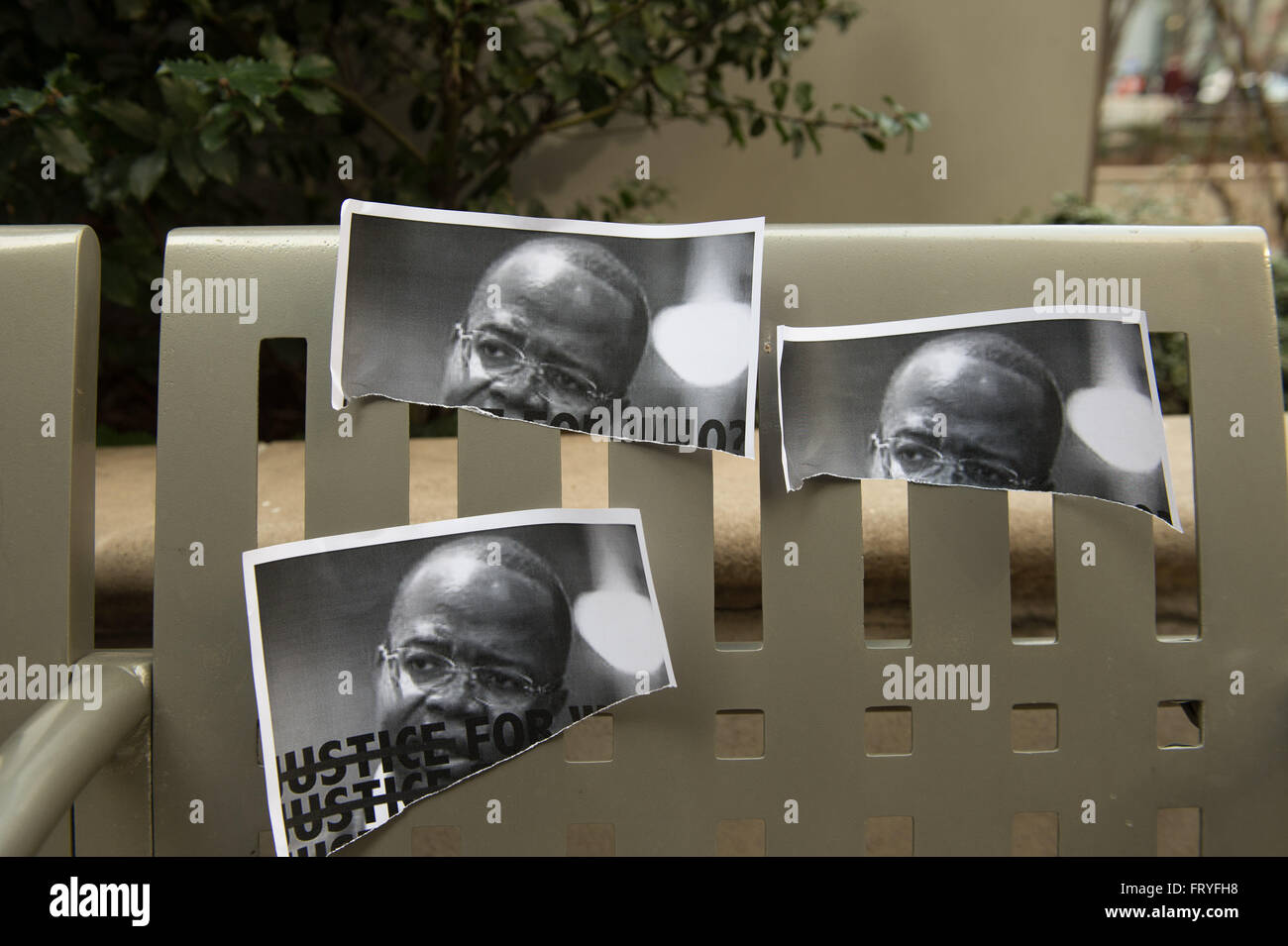 New York, NY, USA. 24th Mar, 2016. A protest sign is taped to a bench ...
