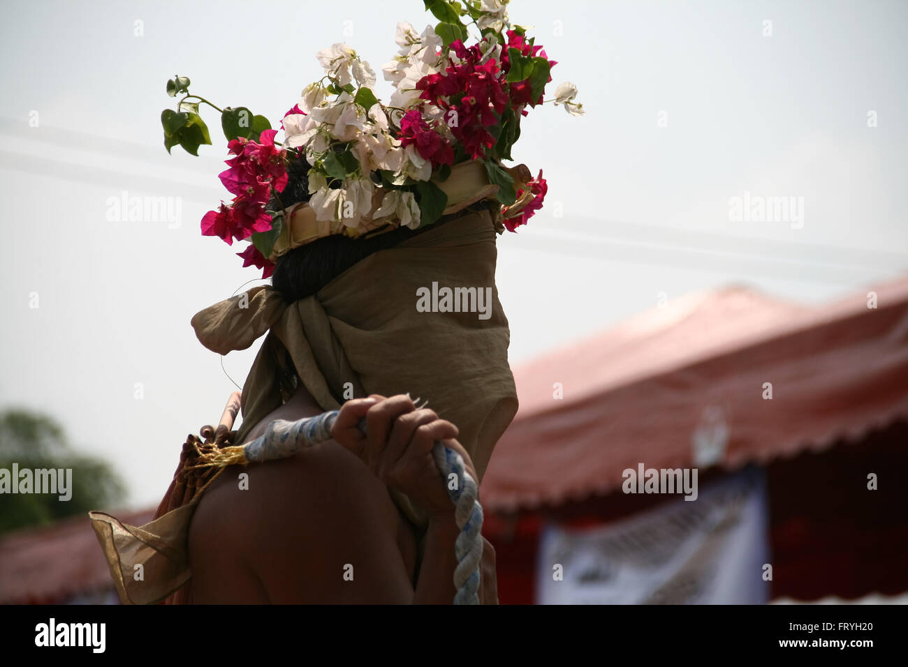 Philippines. 25th Mar, 2016. A Penitent with a flower head dress ...