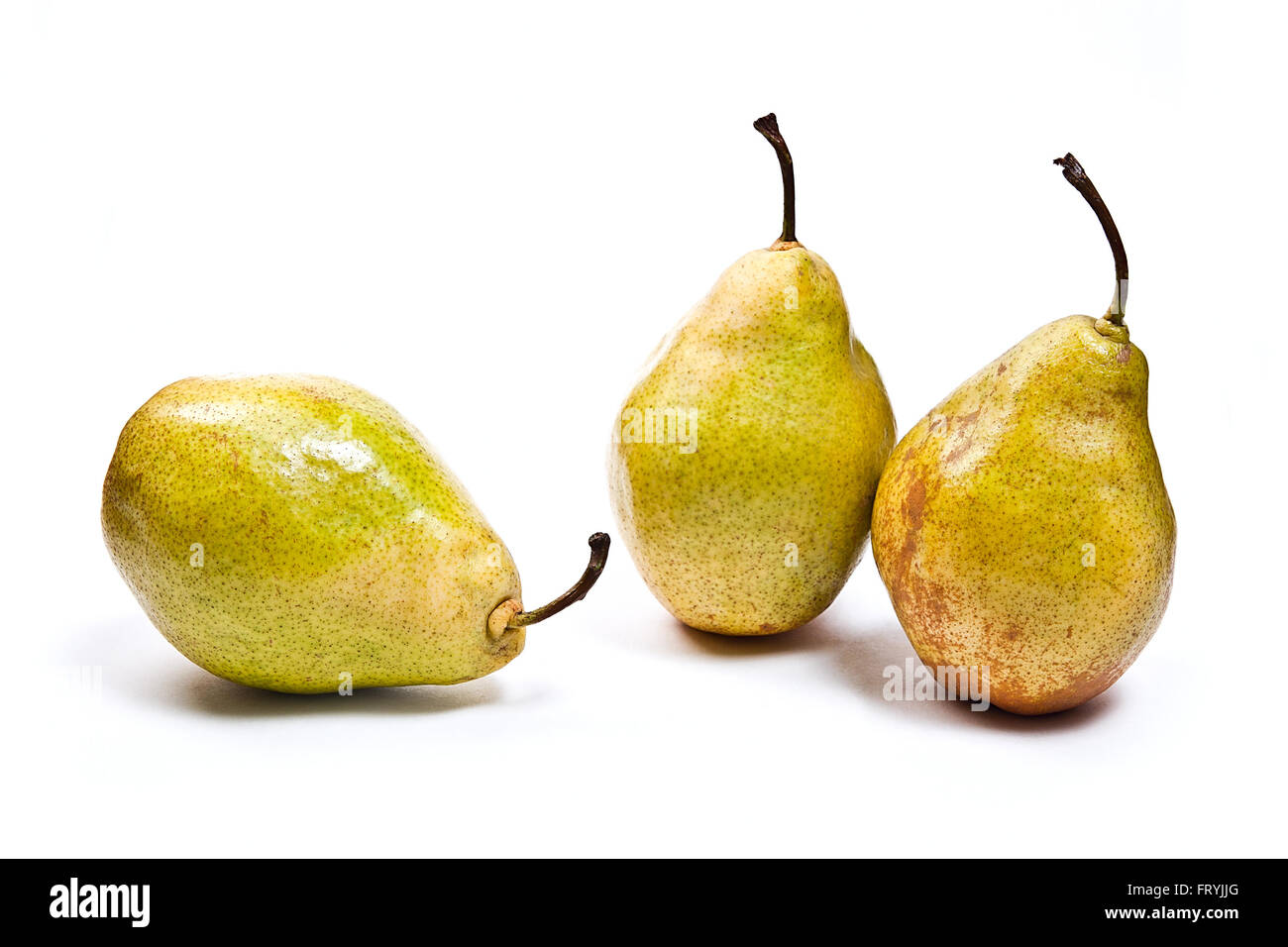 Three fresh green pears. Group of juicy ripe fruits. View of conference ...