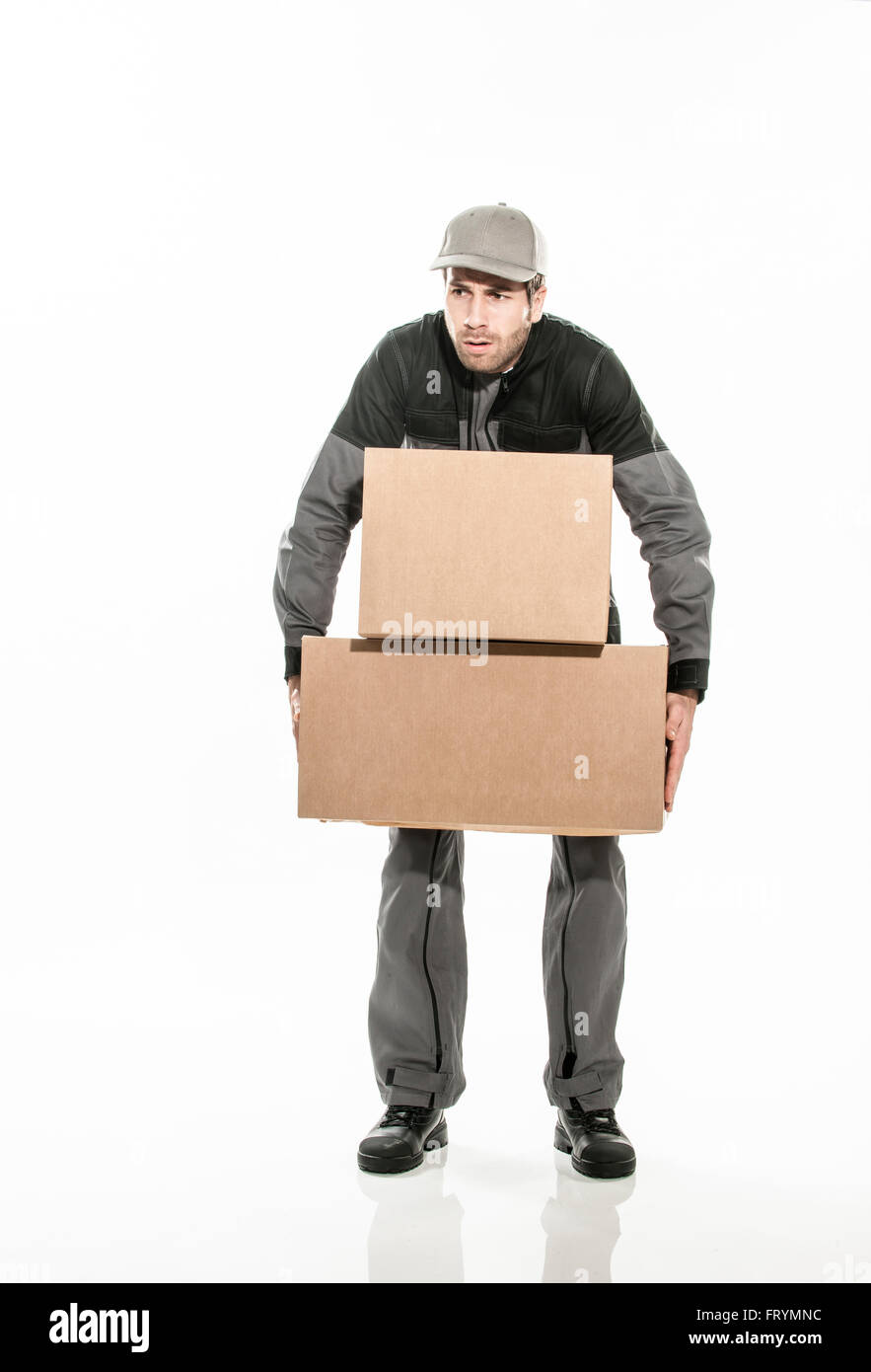 worker carrying too heavy boxes on isolated background Stock Photo - Alamy