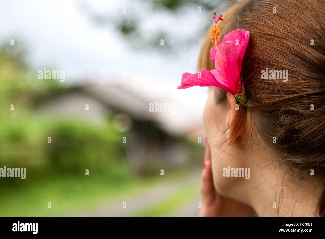 close up of woman with flowers in her head Stock Photo - Alamy