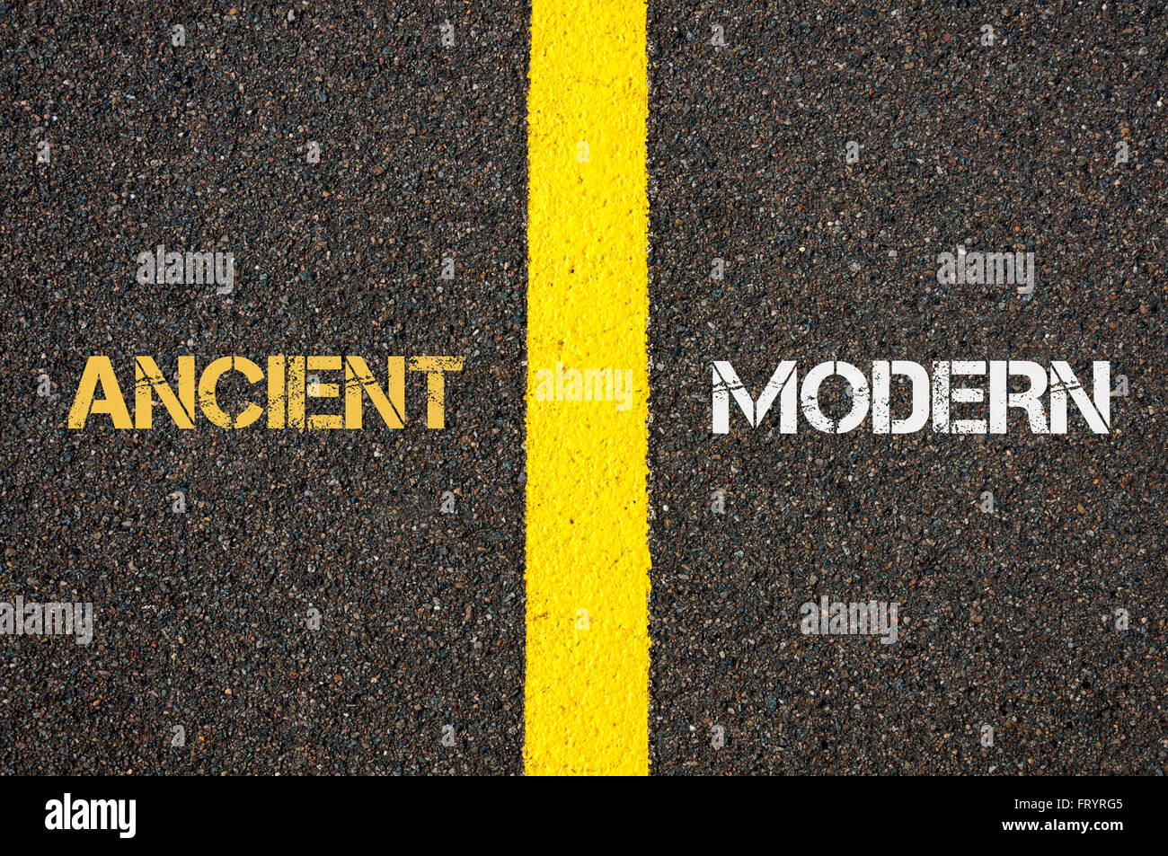 Antonym concept of ANCIENT versus MODERN written over tarmac, road ...