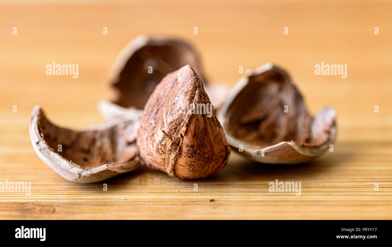 macro hazelnut and nutshell on wood Stock Photo - Alamy