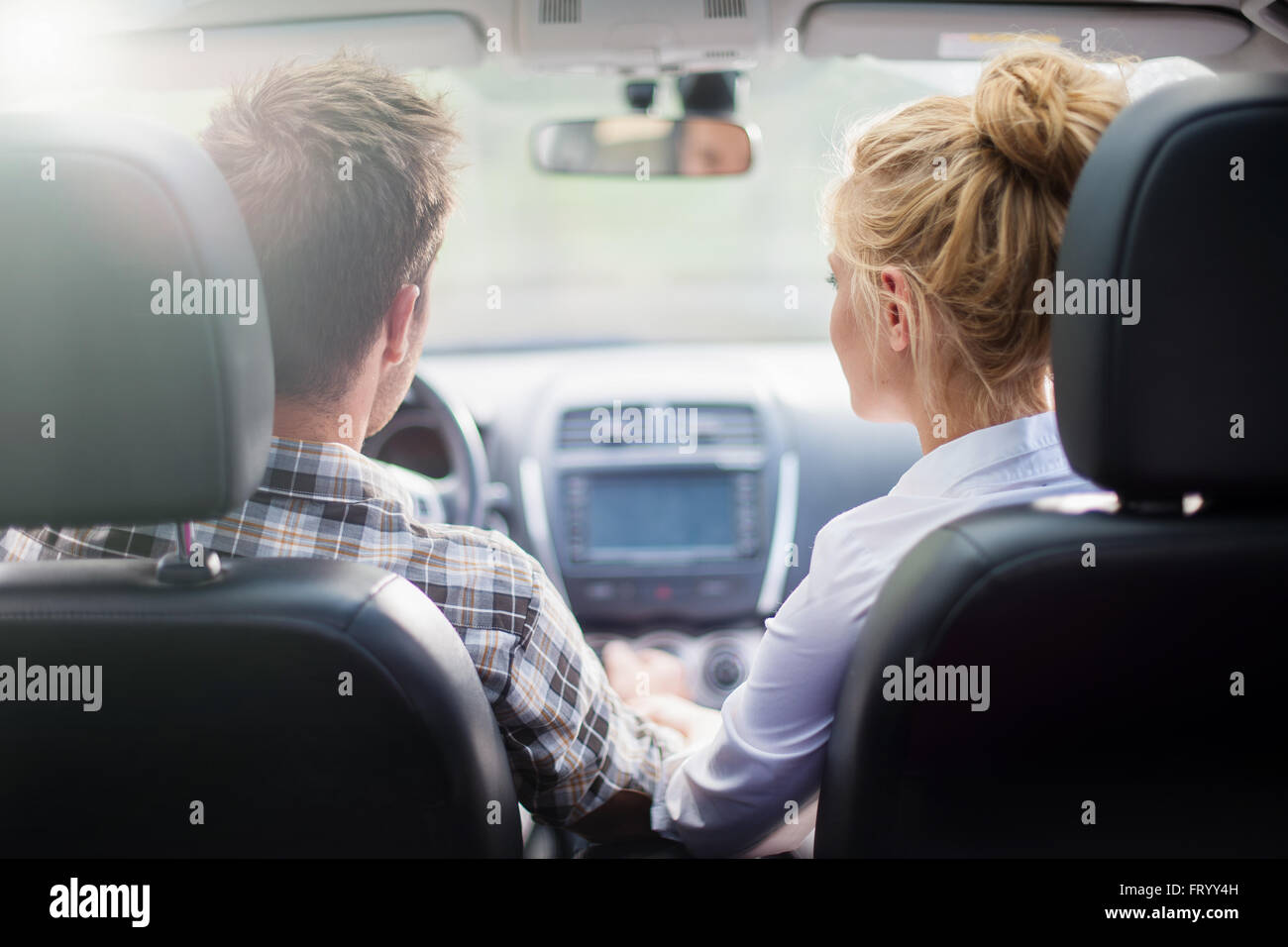Driving a car from the back seat hi-res stock photography and images ...