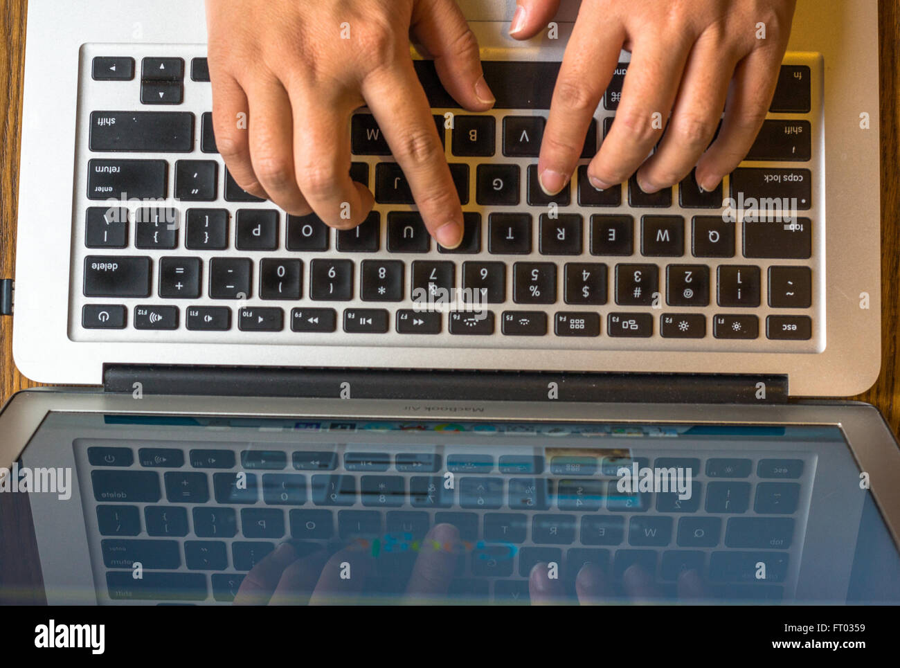 Typing at laptop hi-res stock photography and images - Alamy