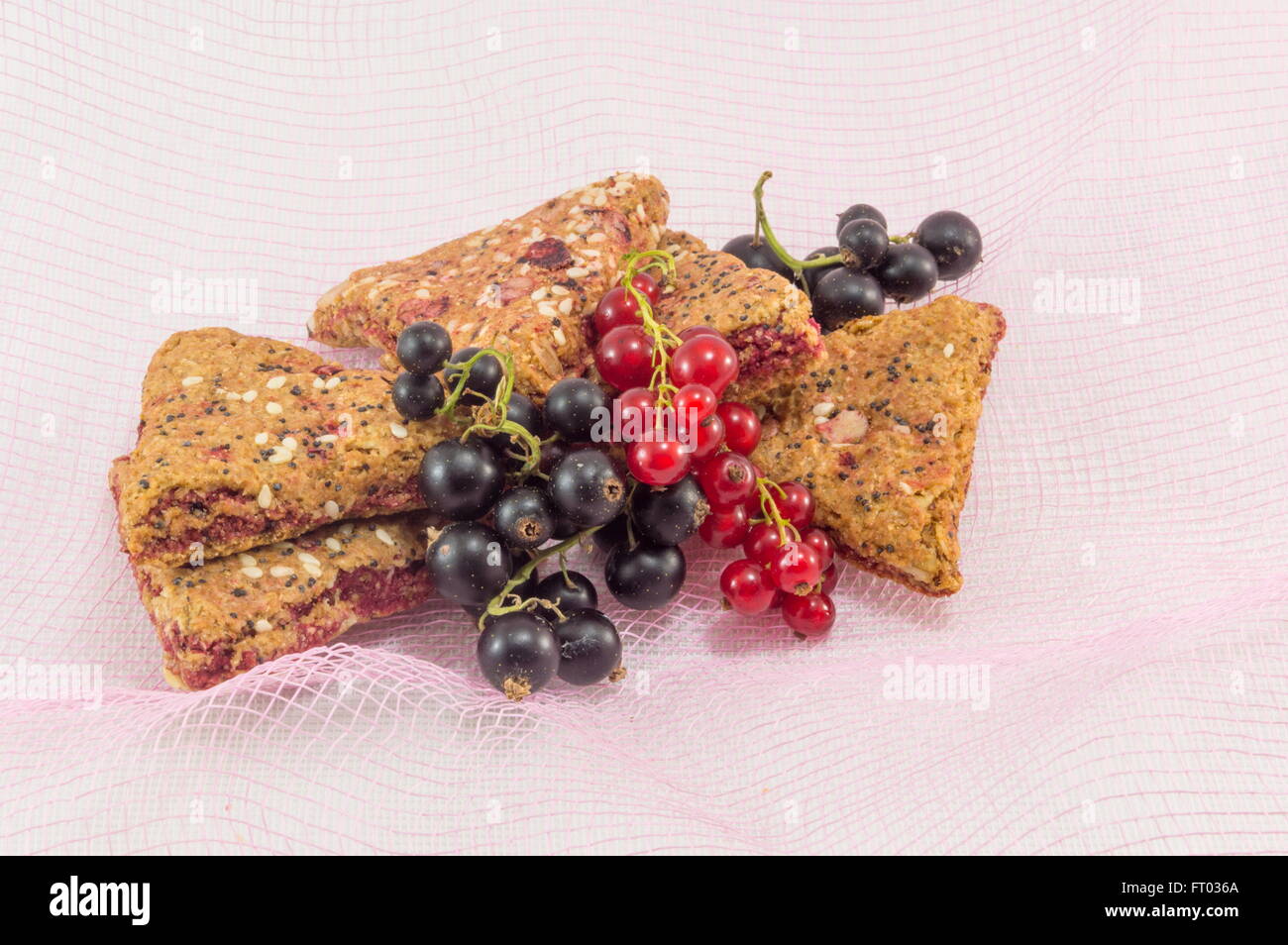 Bunch of integral fruit biscuits with fresh fruit Stock Photo - Alamy