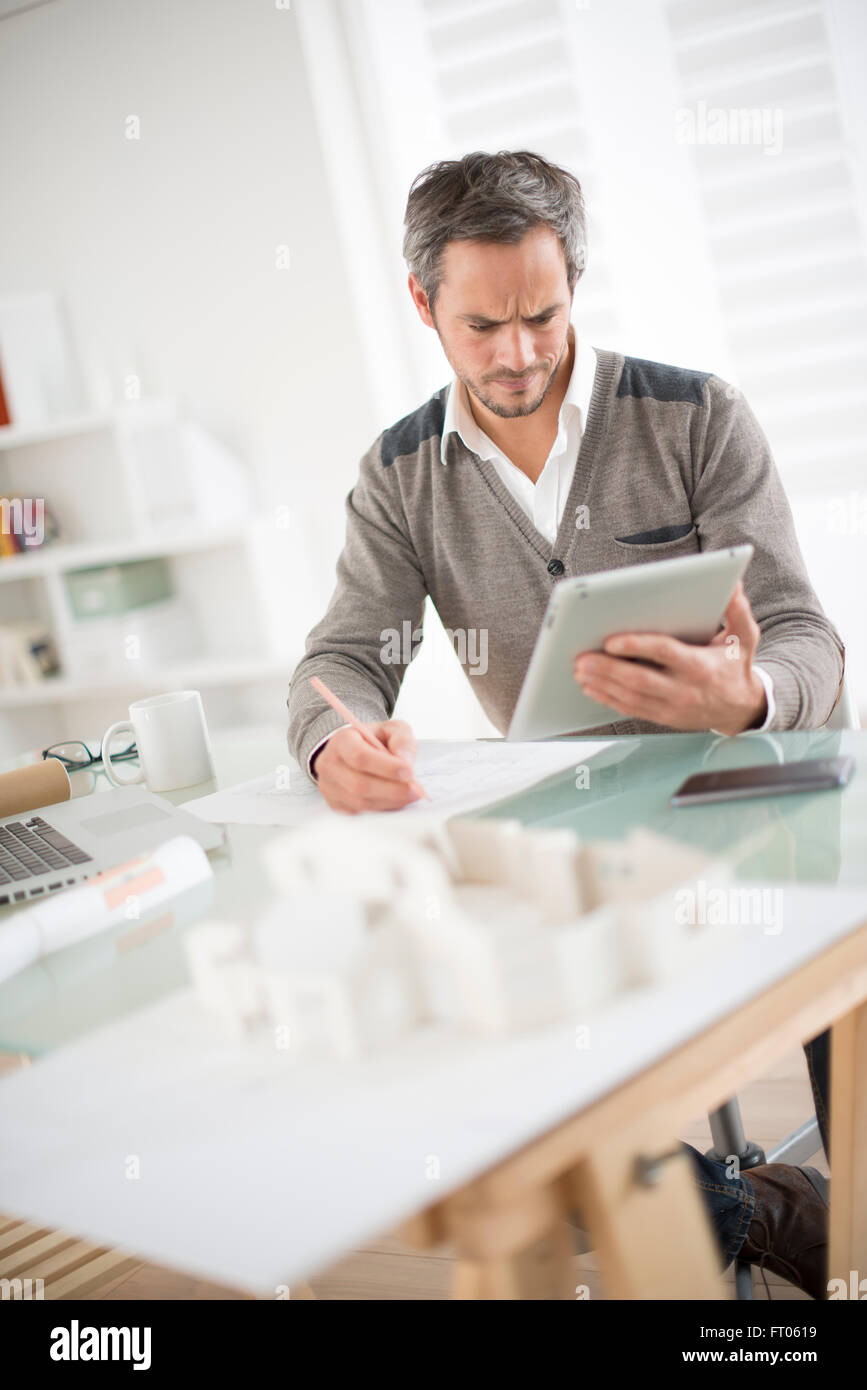 architect working on the office Stock Photo - Alamy