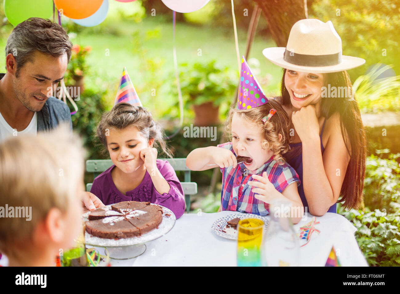 Three People Sharing Piece Of Cake High Resolution Stock Photography ...