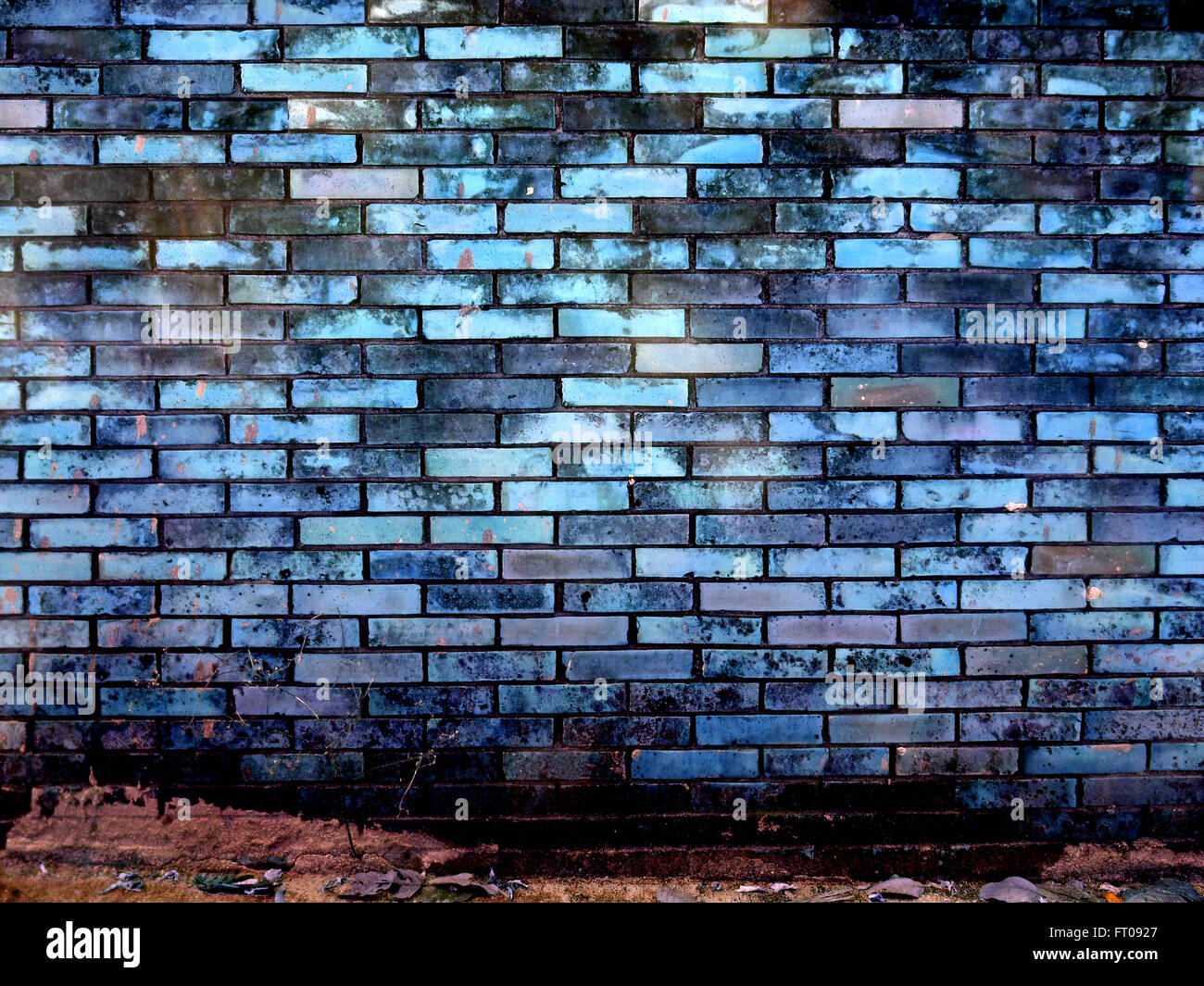 Ancient blick wall background blue surface Stock Photo - Alamy