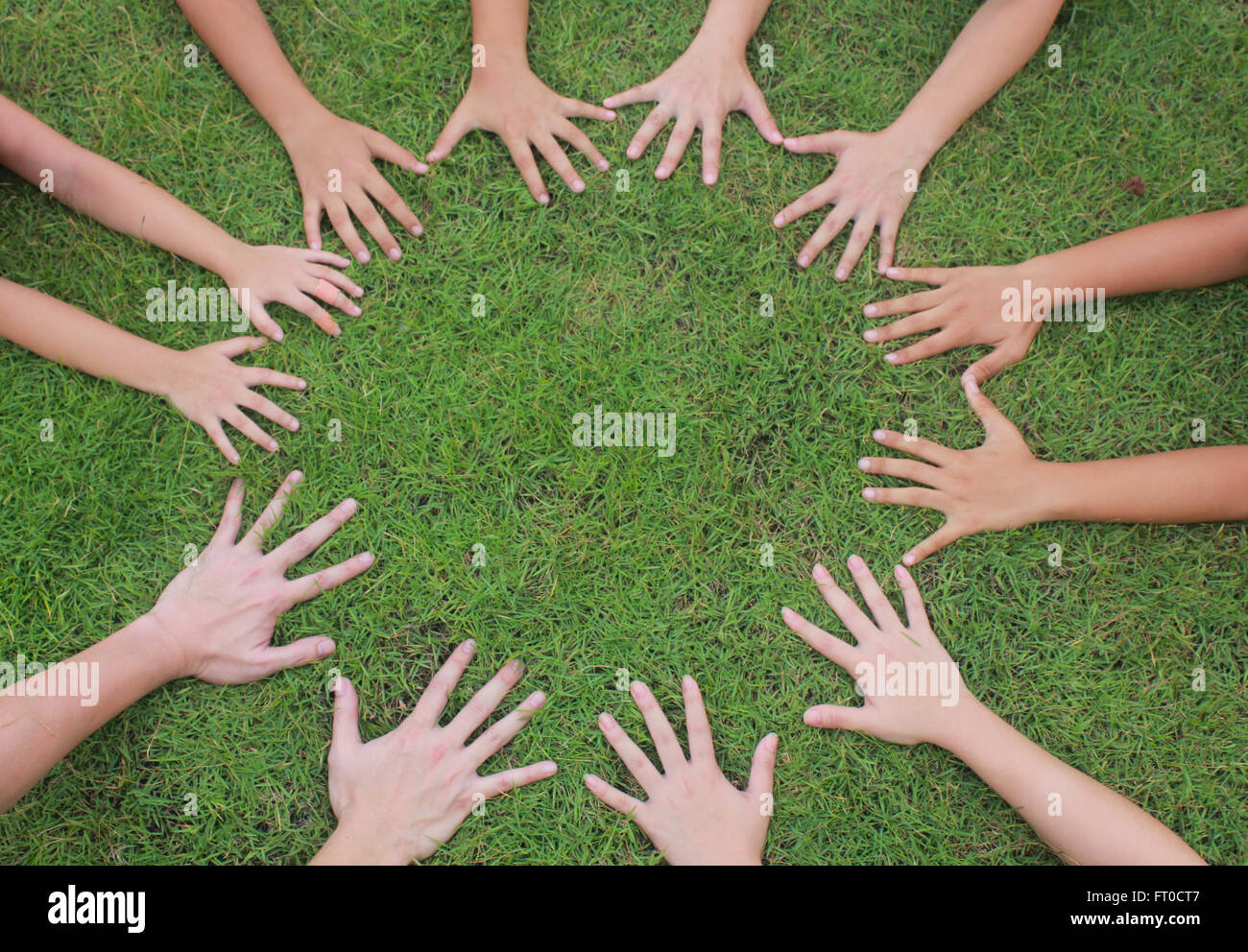 Children hands circle hi-res stock photography and images - Alamy