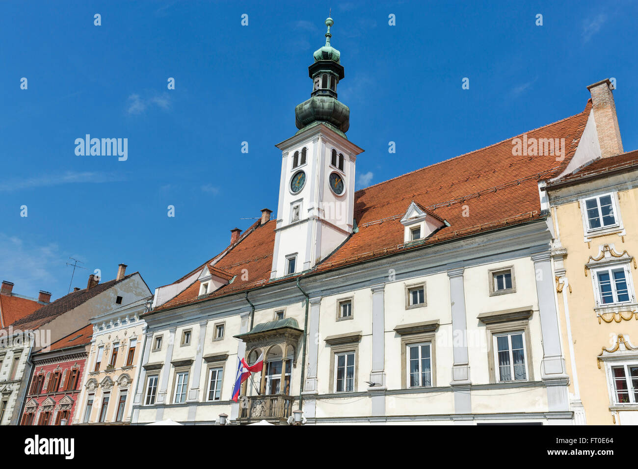 Maribor Town Hall with national and municipal flags and flag of EU ...