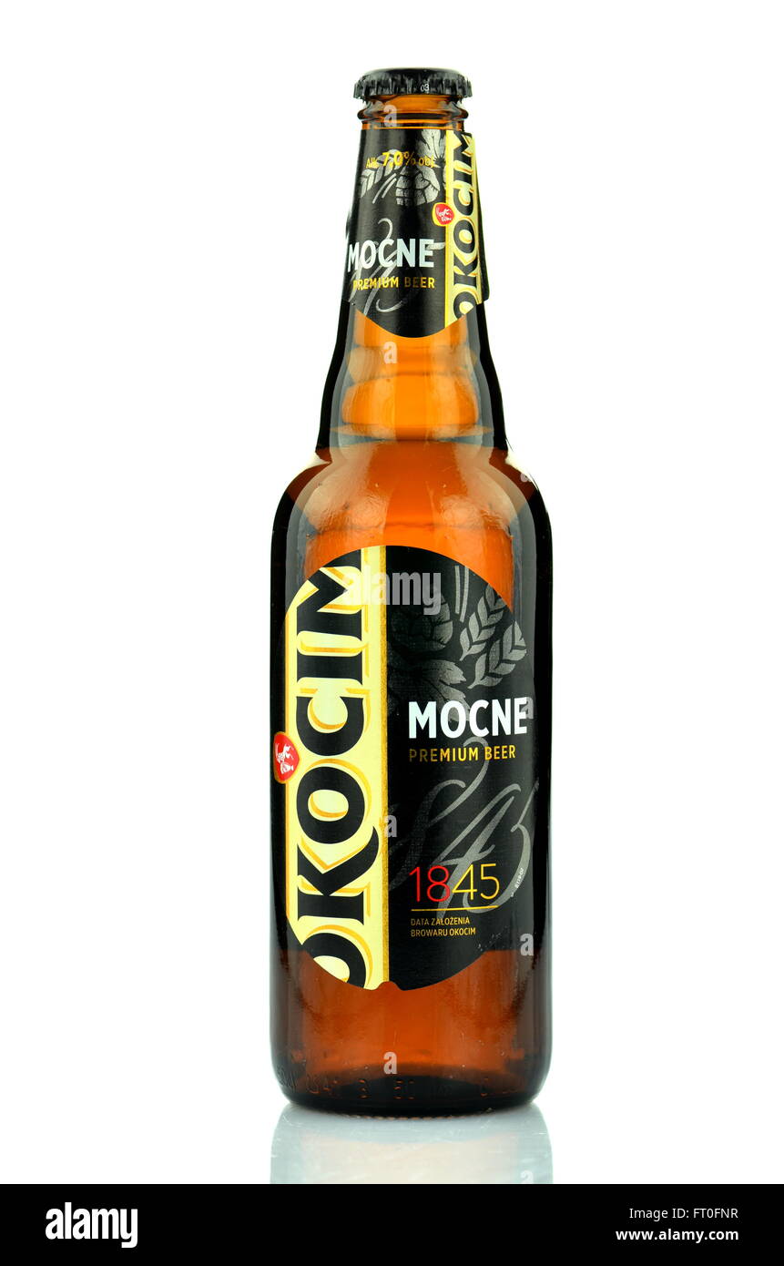 Okocim full light beer isolated on white background. Okocim Brewery was ...