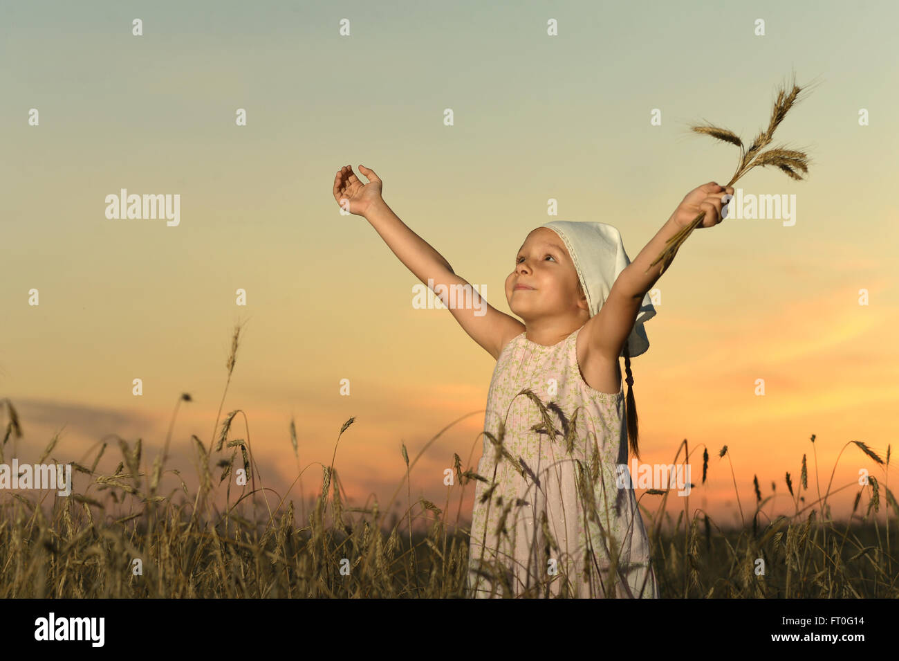 Cute little standing girl Stock Photo - Alamy