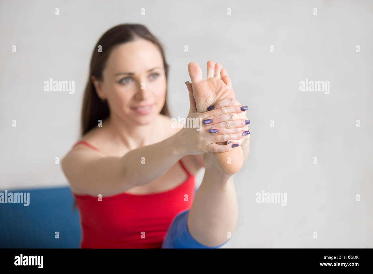 Beautiful happy young woman in bright colorful sportswear working out ...