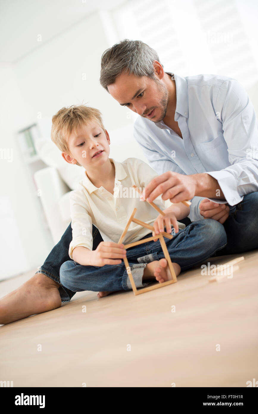 father and son building a small house Stock Photo - Alamy