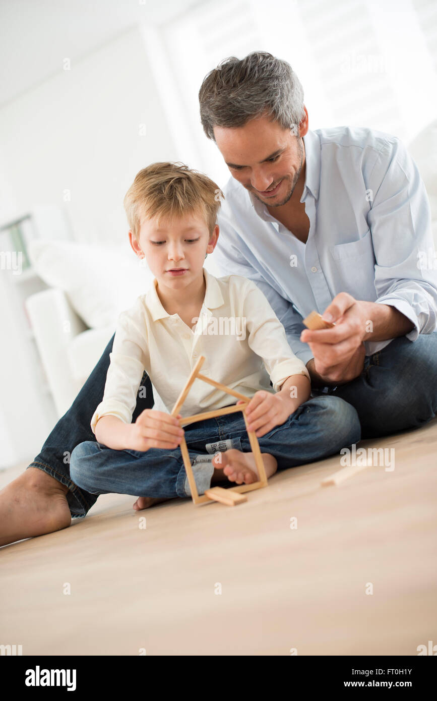 father and son building a small house Stock Photo - Alamy