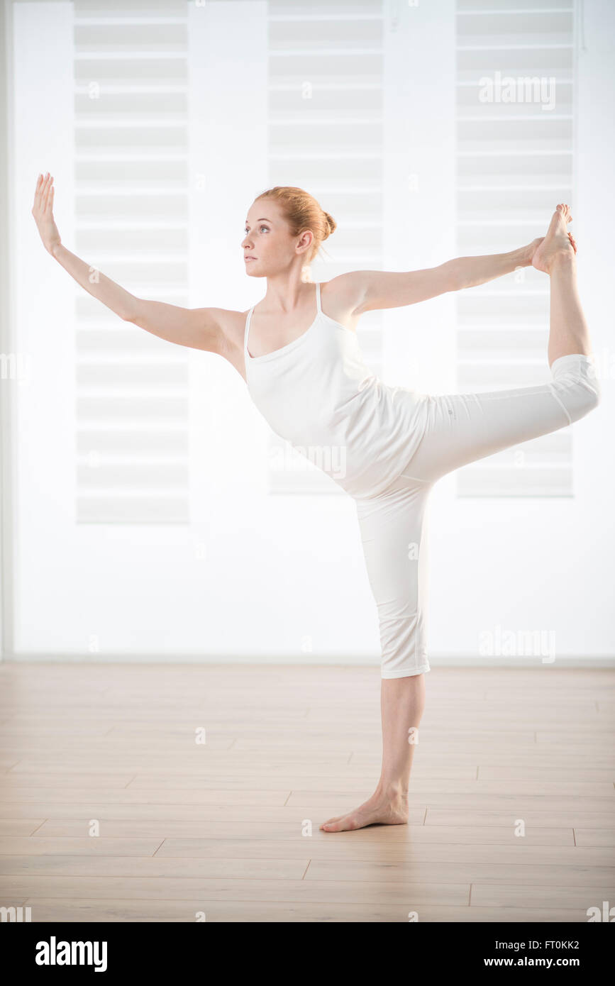 young woman practicing exercises easing Stock Photo - Alamy