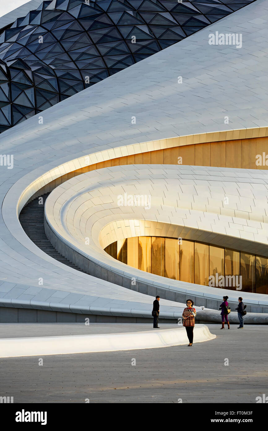 Detail of exterior facade with visitors. Harbin Opera House, Harbin ...