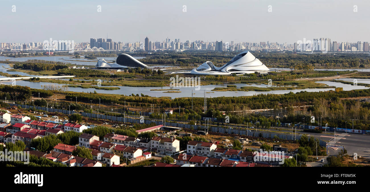 Aerial view of opera house embedded in Harbin's wetland with urban ...