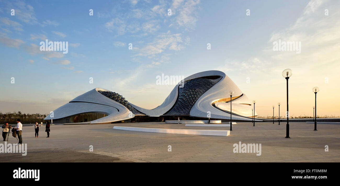 Landscaped open piazza in front of building. Harbin Opera House, Harbin ...