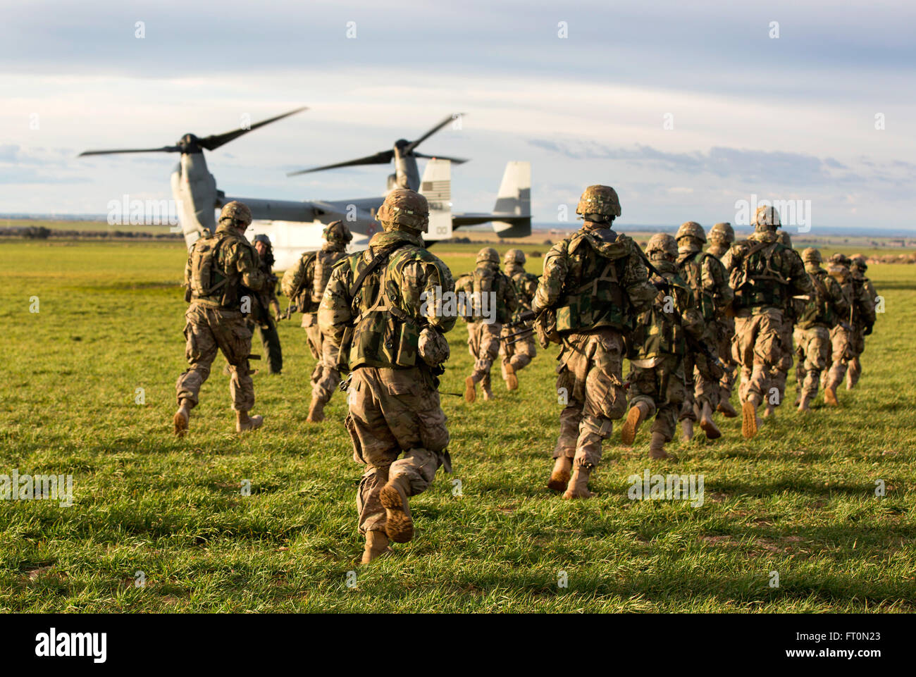 U.S. soldiers with 173rd Airborne Brigade Combat Team prepare to board ...