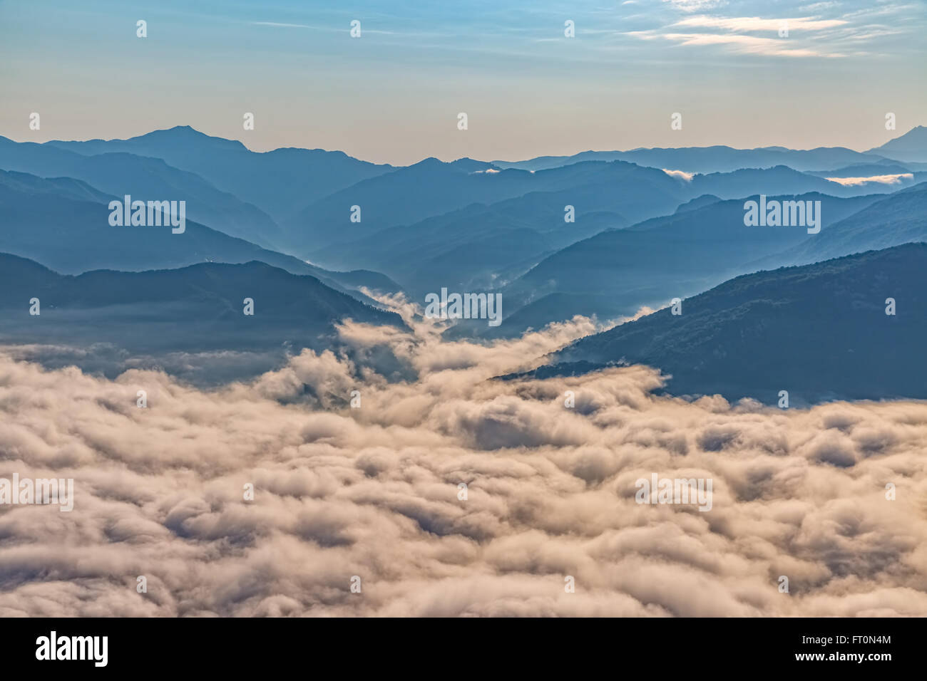 Mountain misty clouds aerial Stock Photo - Alamy