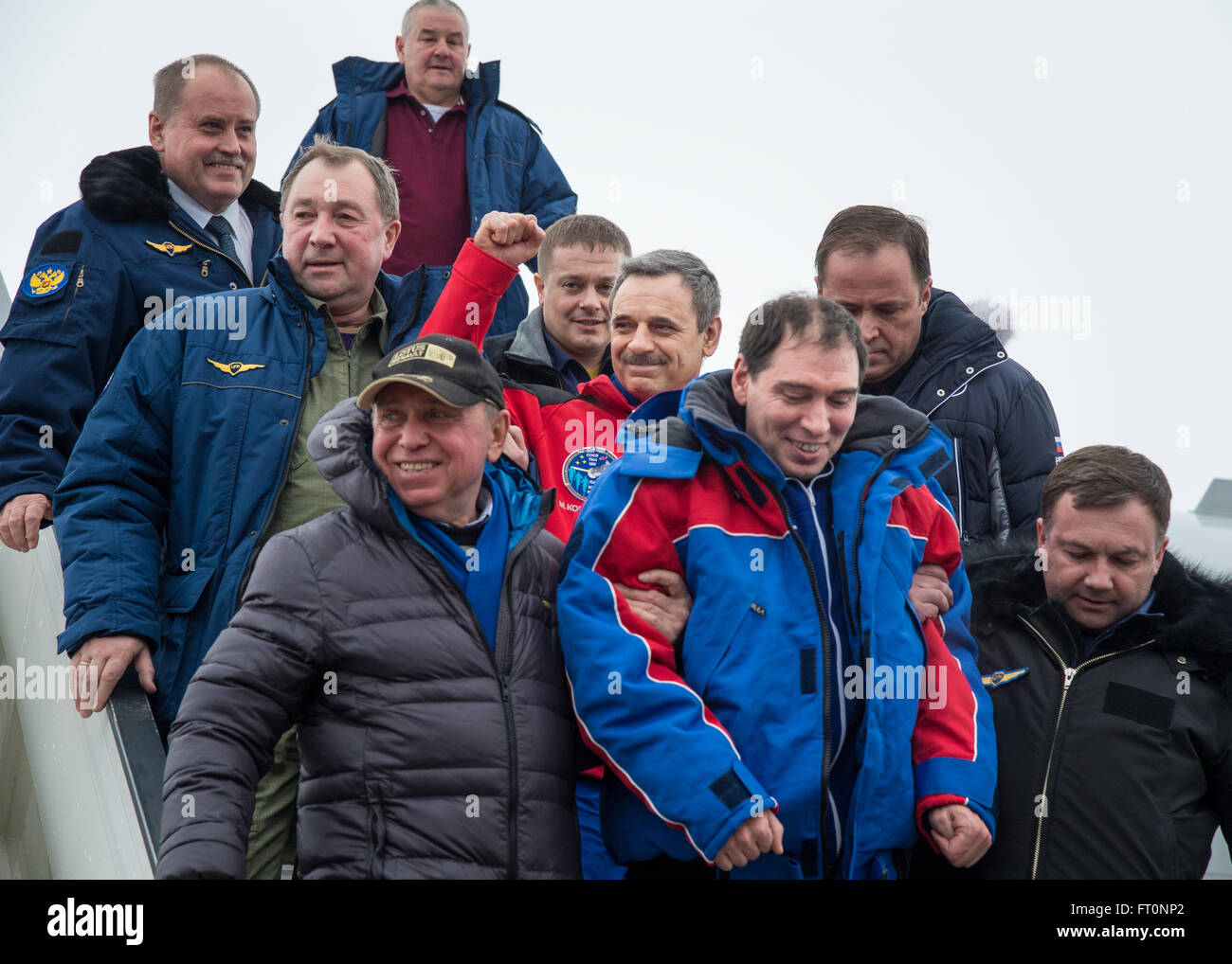 Russian cosmonauts Mikhail Kornienko and Sergey Volkov, along with NASA ...
