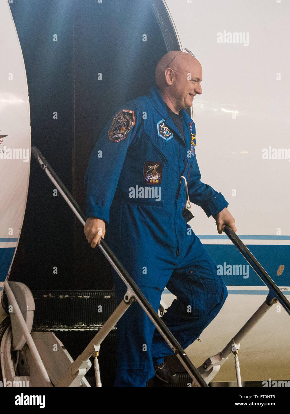Expedition 46 Commander Scott Kelly of NASA disembarks at Ellington ...