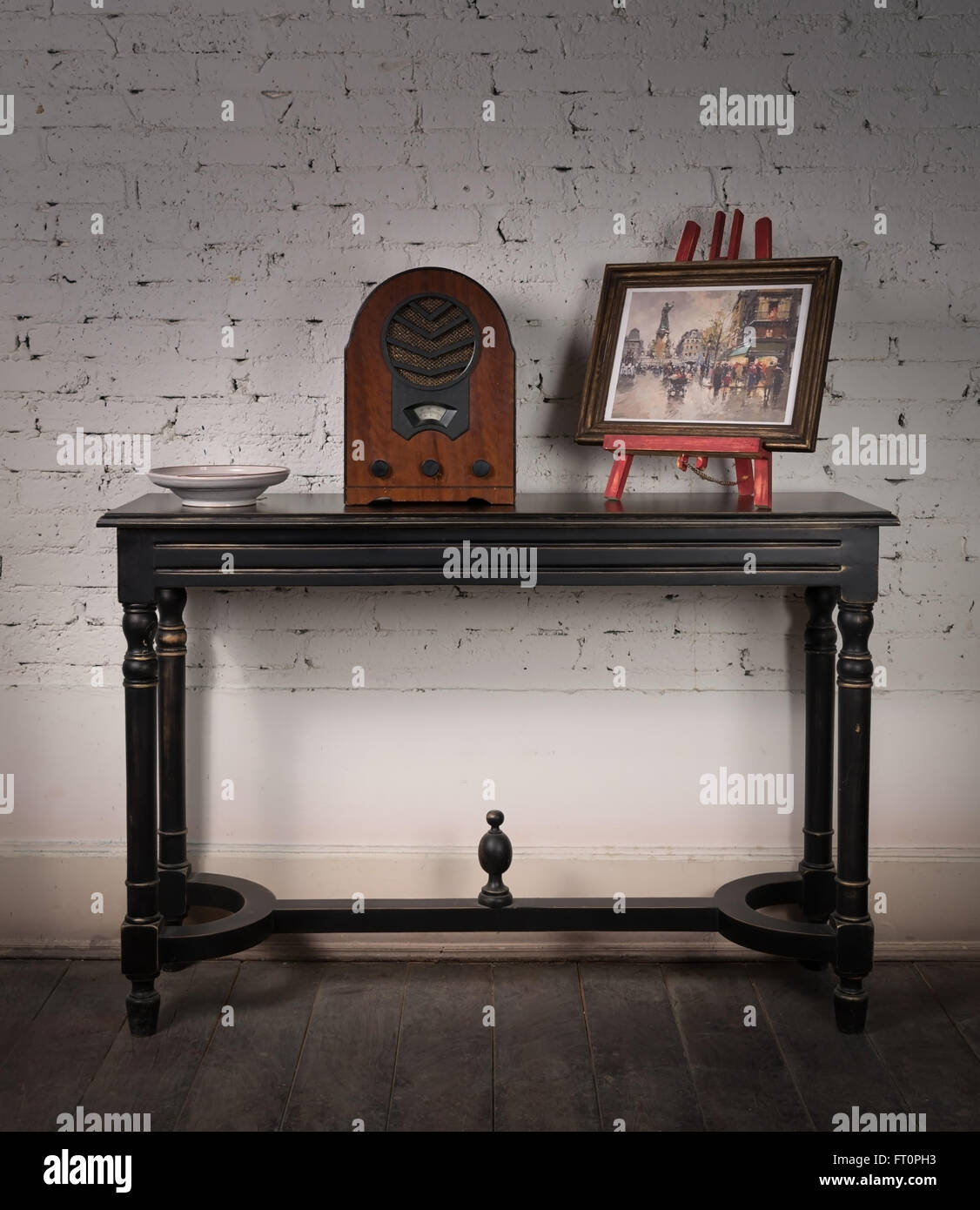 Vintage still life of an old analogue wooden radio and wooden framed ...