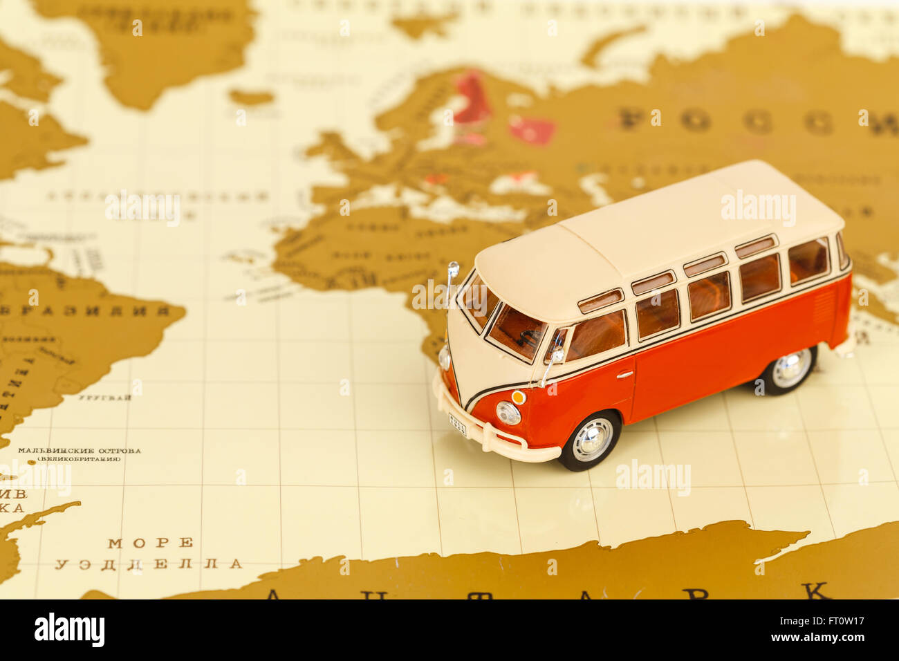 Volkswagen Camper toy on the world map Stock Photo - Alamy