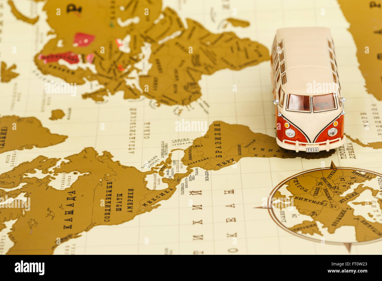 Volkswagen Camper toy on the world map Stock Photo - Alamy