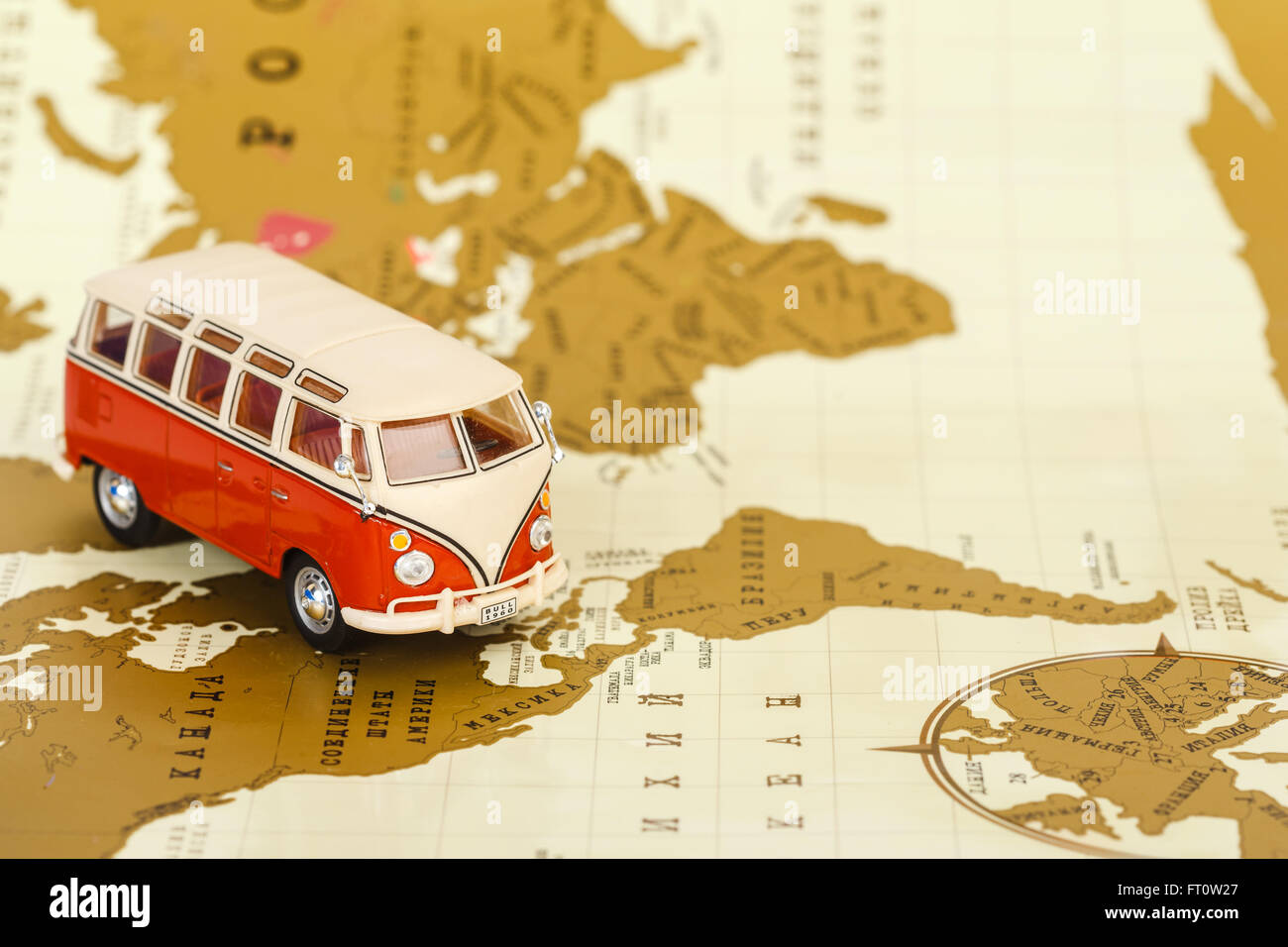 Volkswagen Camper toy on the world map Stock Photo - Alamy