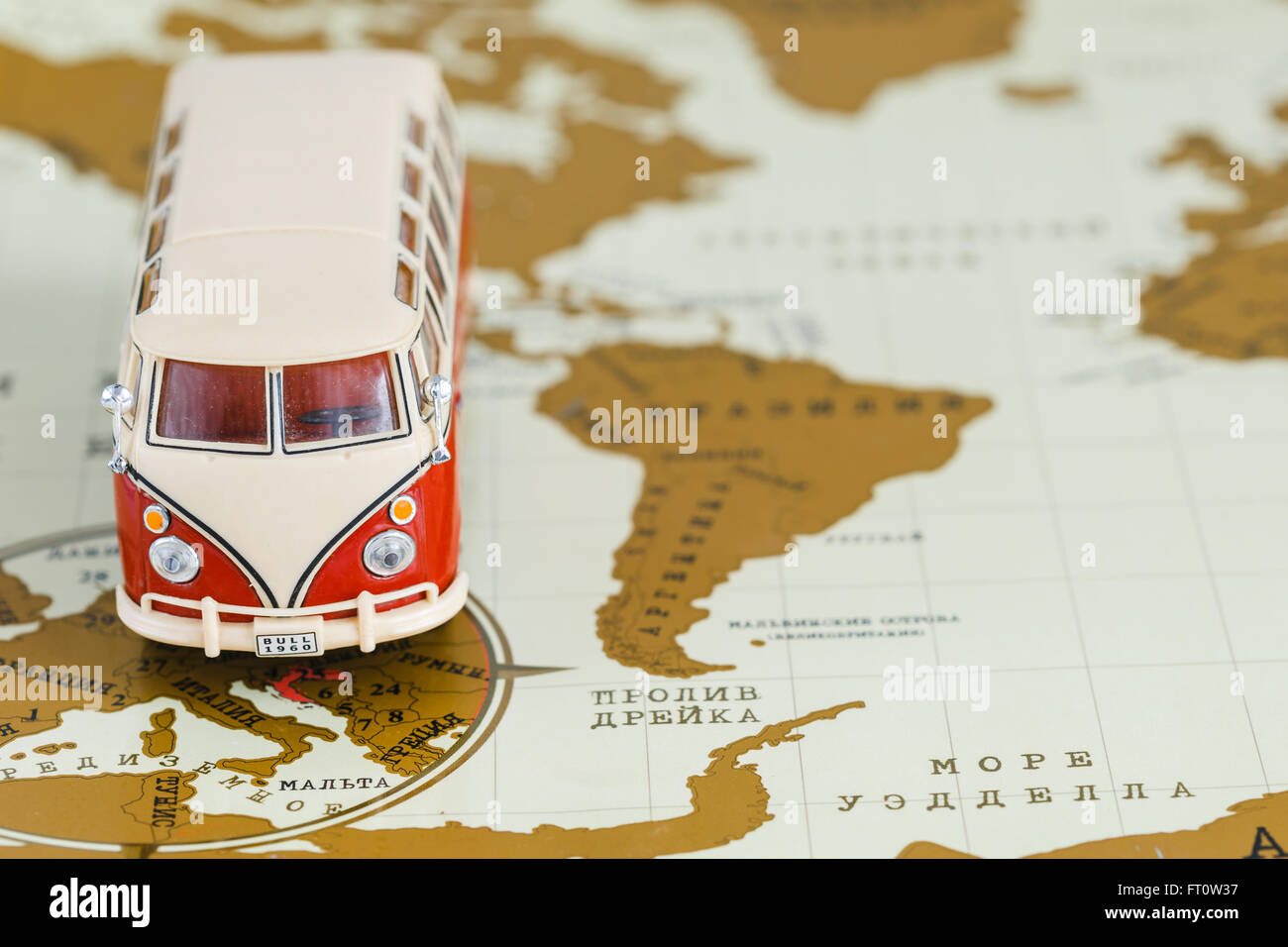Volkswagen Camper toy on the world map Stock Photo - Alamy