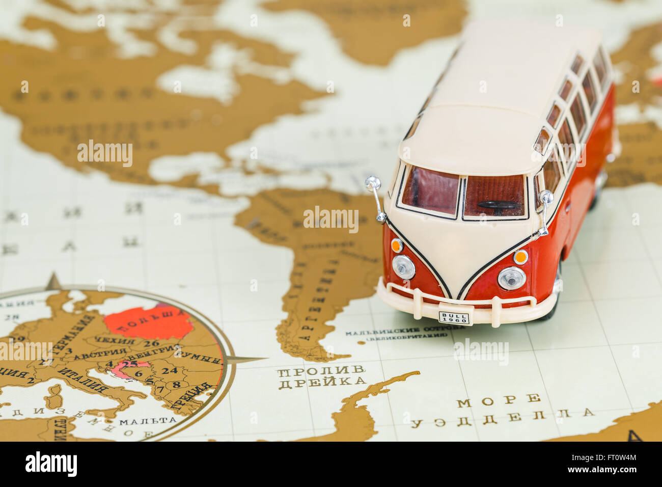 Volkswagen Camper toy on the world map Stock Photo - Alamy