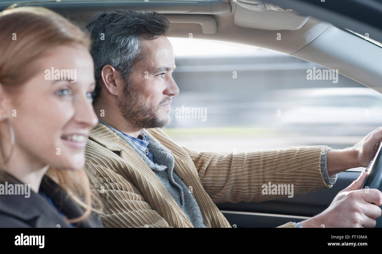 handsome couple in their car Stock Photo - Alamy